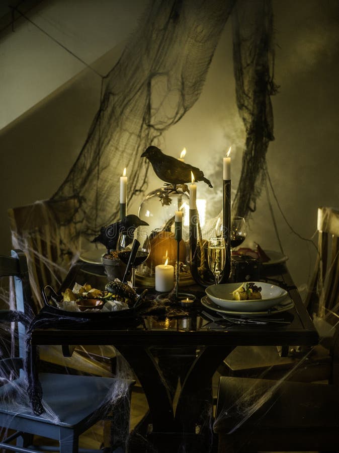 Table Setup for a Halloween Diner Stock Image - Image of burning ...