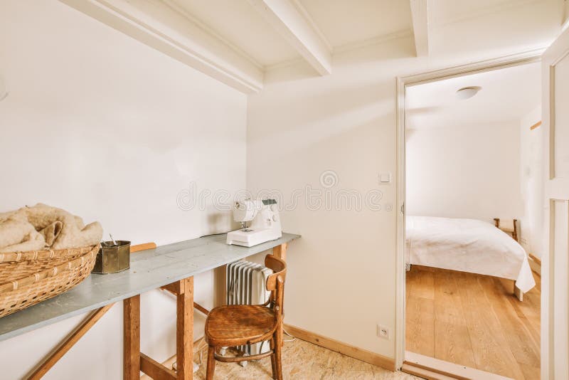 Table with a Sewing Machine in a Bright Room Stock Photo - Image of ...