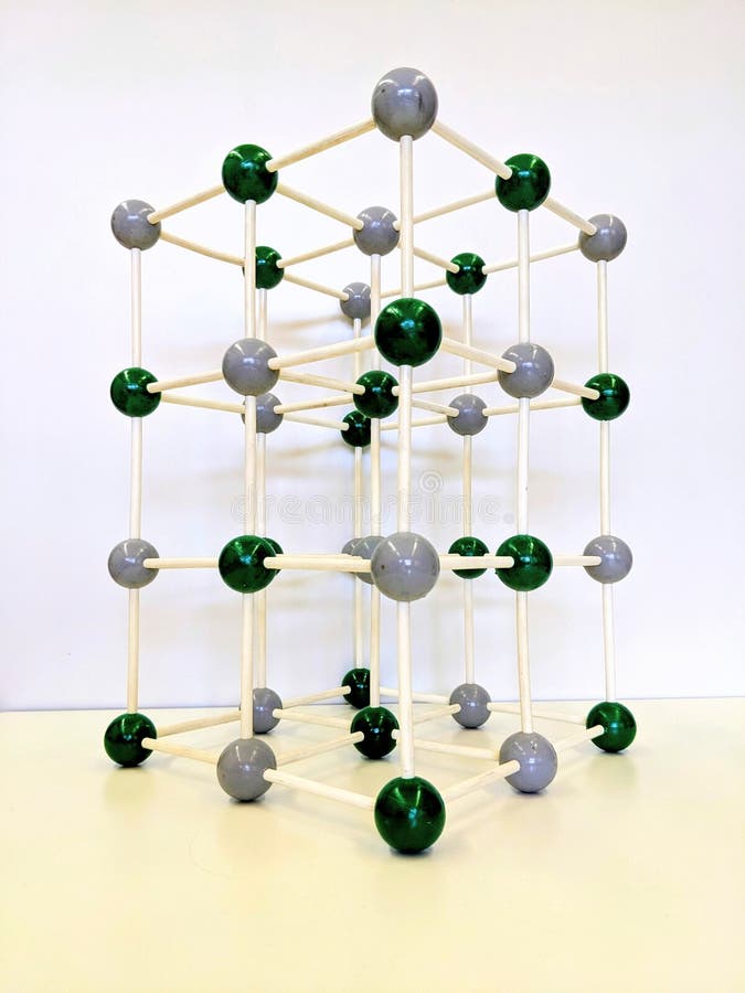 A Model of a Cube Made of Sticks and Balls is on a Table Stock Photo ...