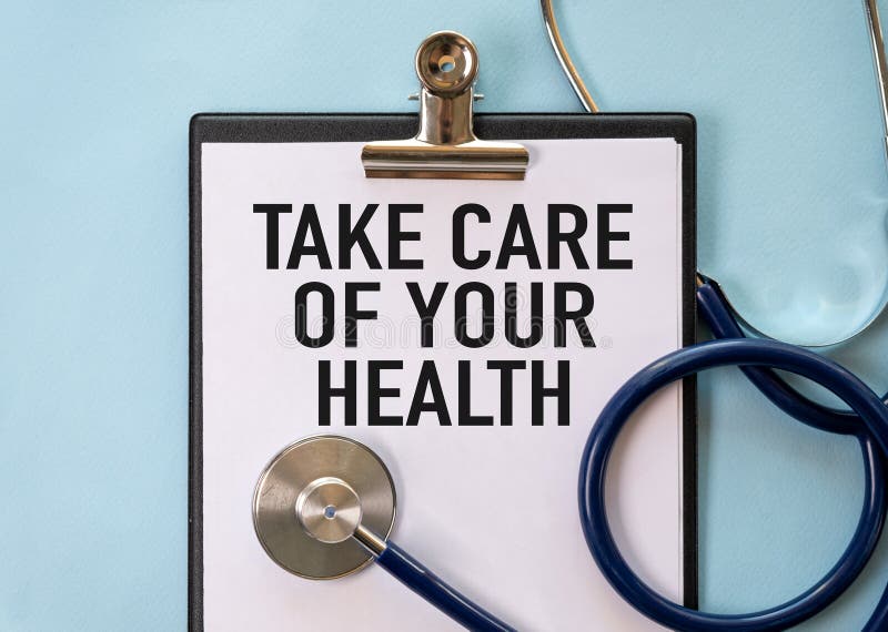 On the Table is a Stethoscope, a Pen and a Notebook in Which it is ...