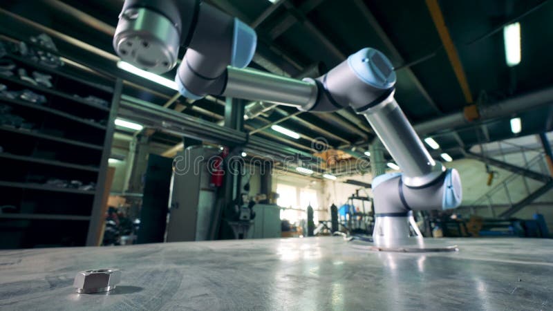 Table in a Storage Unit with a Moving Robot Attached To it Stock Video ...