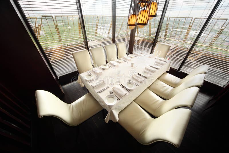 Table and Ten White Chairs in Empty Restaurant Stock Image - Image of ...