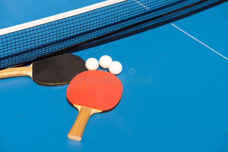 Table Tennis Ball and Bat. stock image. Image of shadow - 253129317