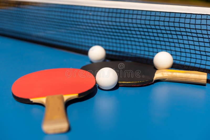 Table Tennis Ball and Bat. stock photo. Image of blue - 254404418