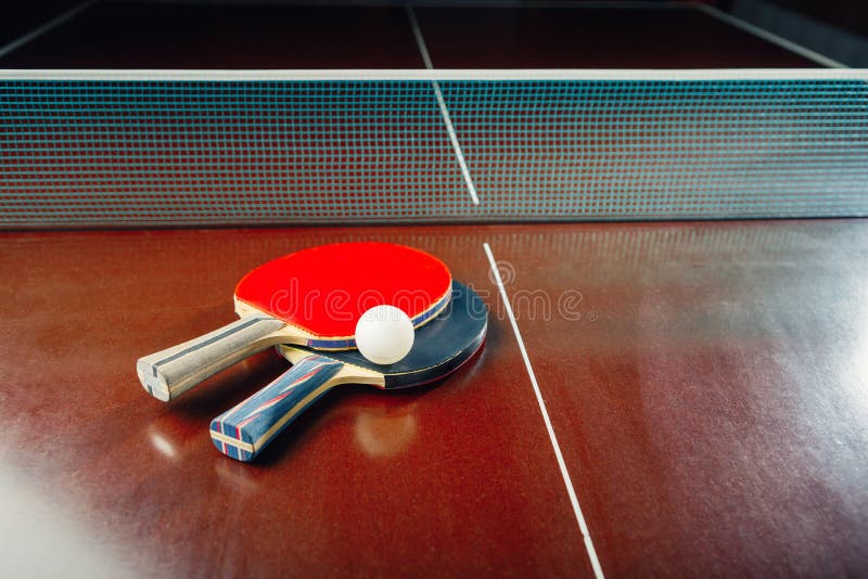 Table Tennis Rackets and Ball, Net Background Stock Photo - Image of ...