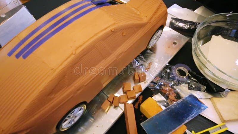 Table with Tools for Modeling and Unfinished Car Stock Video - Video of ...