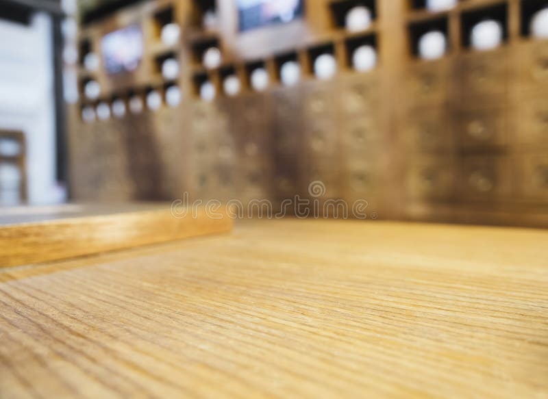 Table Top Counter with Blurred Library Shelf Background Stock Photo ...