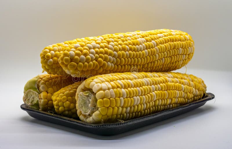 Table Top View of Corn on the Cob, with a White Background, in a Black ...