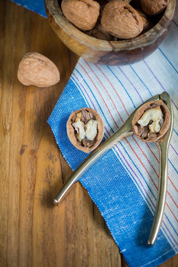 Table Top View on Nut Cracker and Open Walnut Stock Image - Image of ...