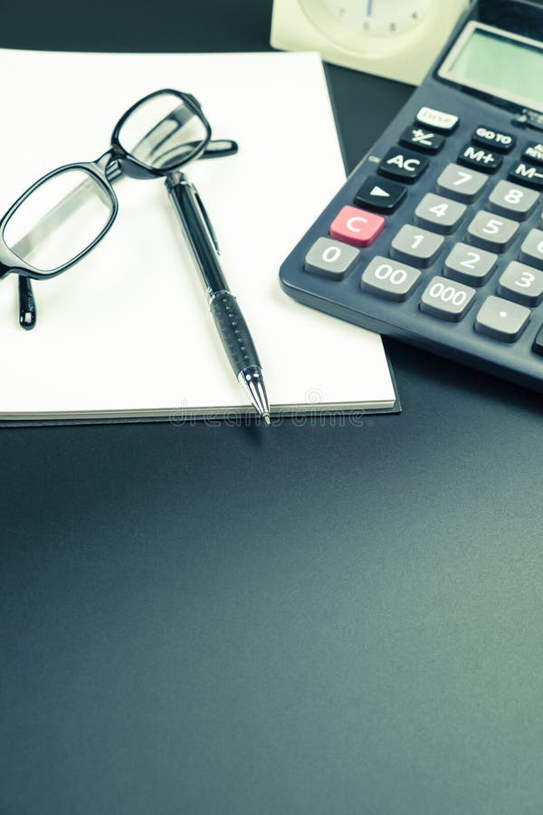 Table Top View of Pen, Notebook and Calculator on Office Desk Stock ...