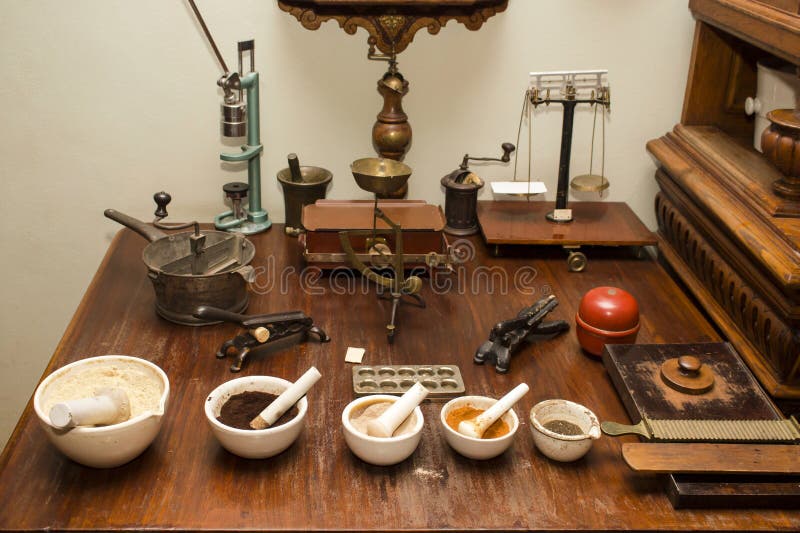 A Table with Different Ancient Instruments, Scales and Mortars for ...