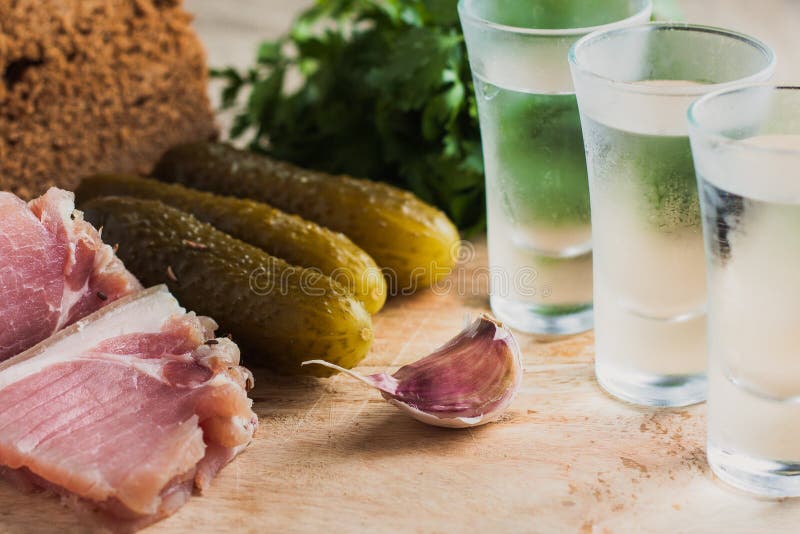 Table with vodka and snack stock image. Image of lifestyle - 182364523
