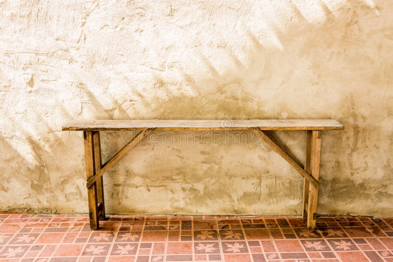 Table on wall background stock image. Image of interior - 65427343