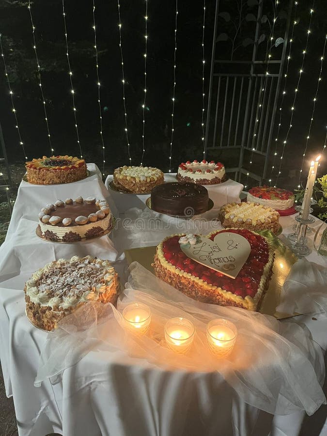 Table with wedding cakes stock photo. Image of decorated - 252752334