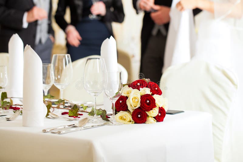 Table at a wedding feast stock image. Image of people - 22130643