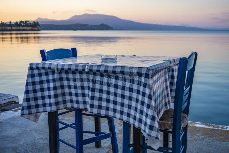 Tables with Beautiful Seaside View at Koroni in Messenia, Greece Stock ...