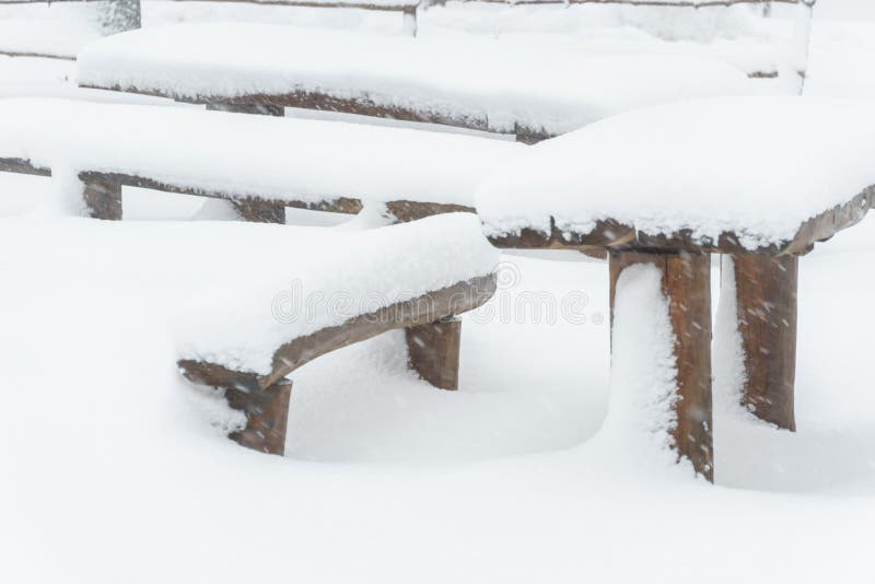 Tables and Benches Covered in Snow in Winter City Park, Blizzard and ...