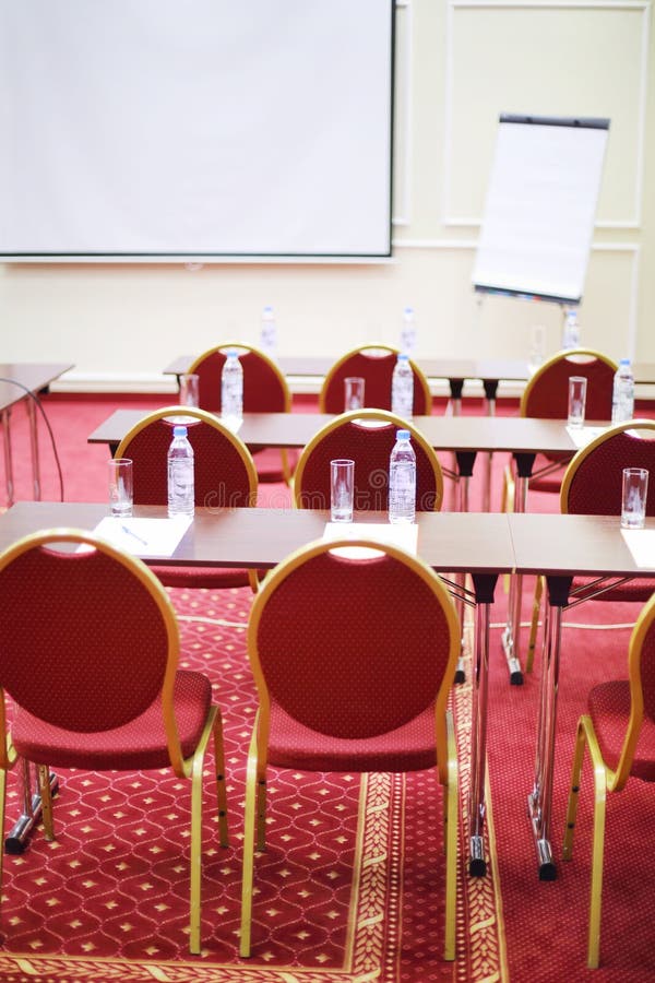 Tables with Bottles and Sheets, Rows of Chairs and Stock Photo - Image ...