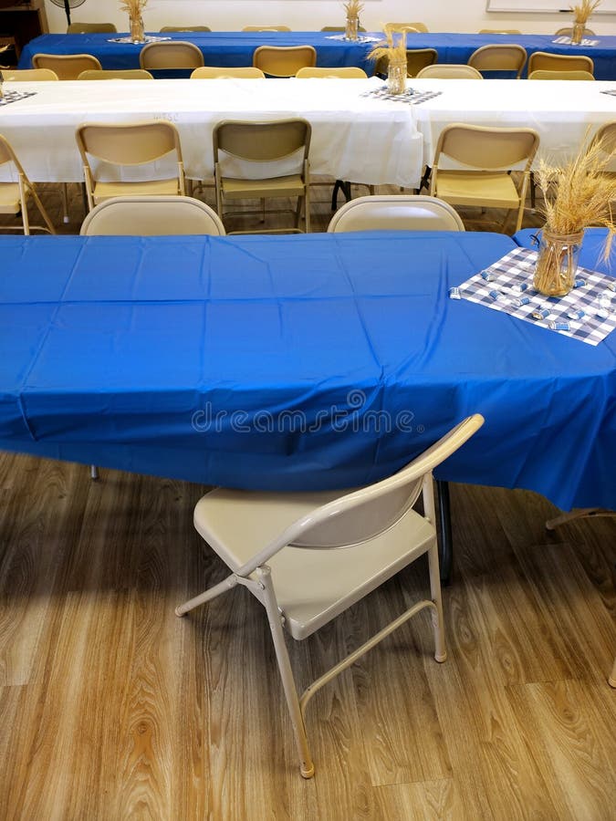 Tables and Chairs Set Up for a Party Blue and White Tablecloth Table ...