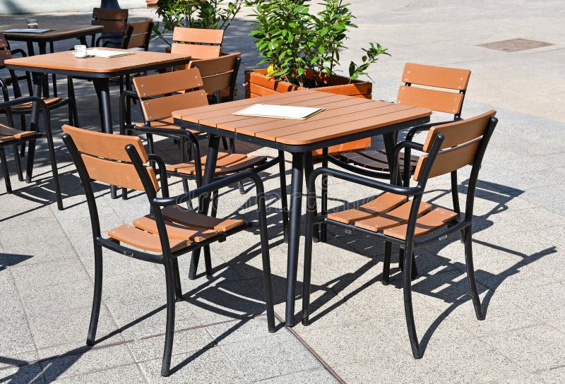 Tables and Chairs on the Street Stock Photo - Image of cafe, restaurant ...