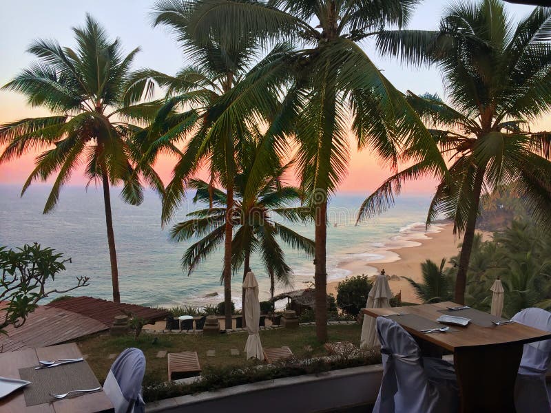 Tables for a Dinner on a Sunset on the Edge of the Rock Over the Sea ...