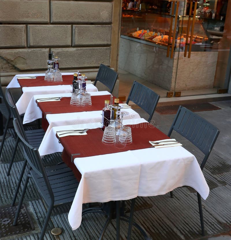 Tables with Glasses and Cutlery in the Restaurant with Outdoor Tables ...