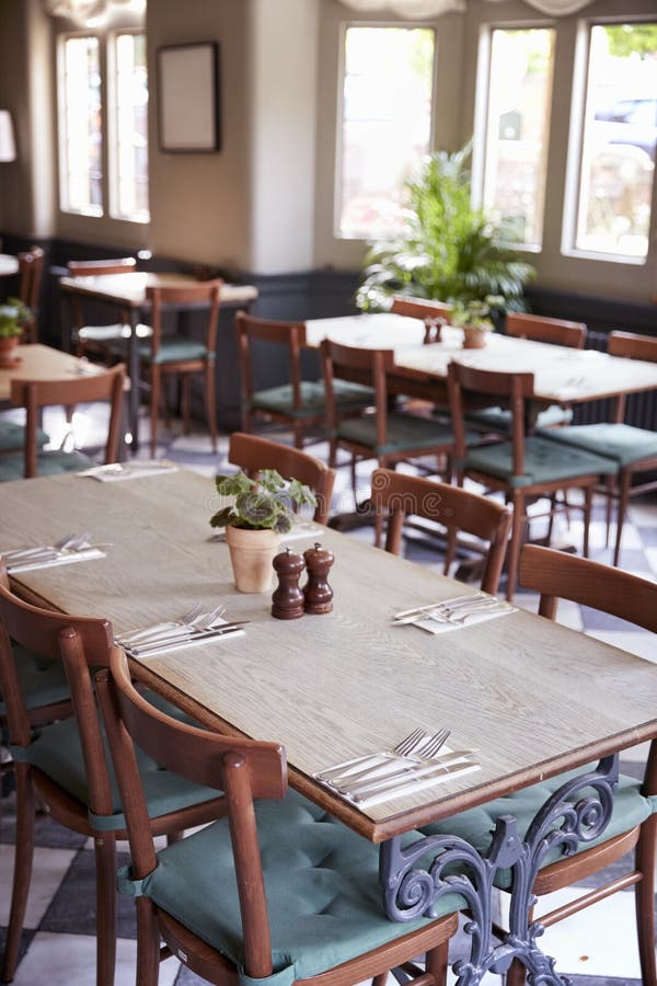 Tables Laid for Service in Empty Restaurant Stock Photo - Image of ...