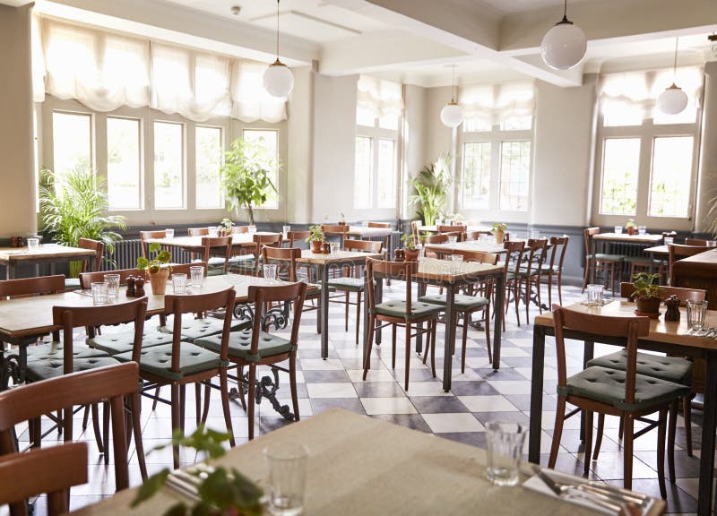 Tables Laid for Service in Empty Restaurant Stock Photo - Image of ...