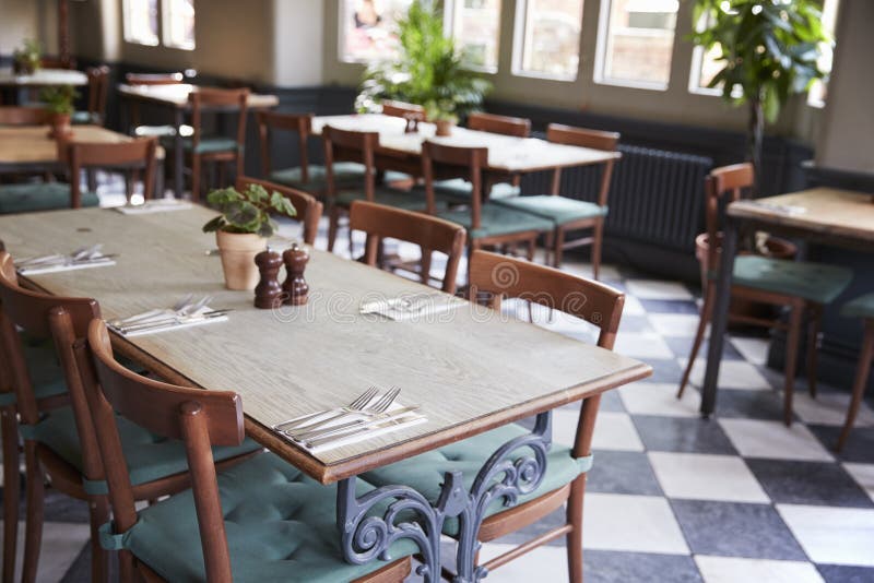 Tables Laid for Service in Empty Restaurant Stock Photo - Image of ...