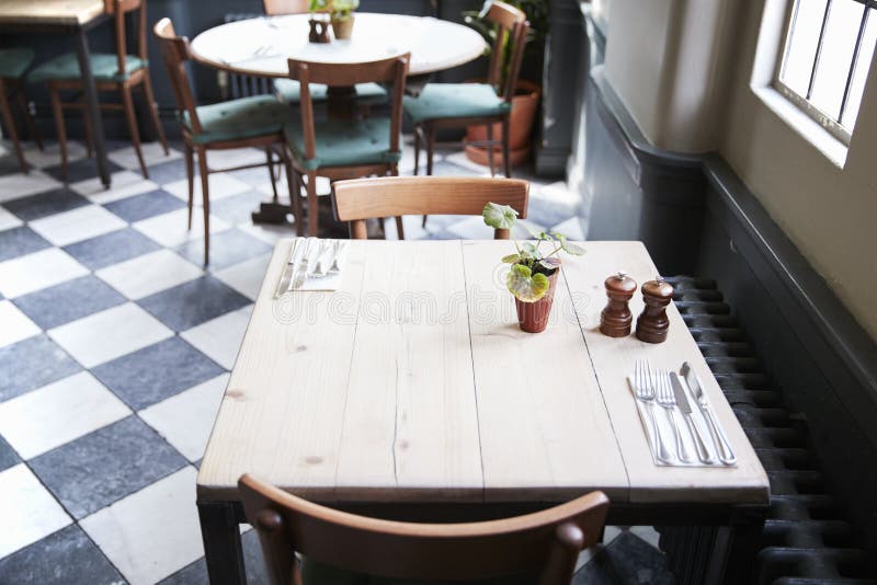 Tables Laid for Service in Empty Restaurant Stock Photo - Image of ...