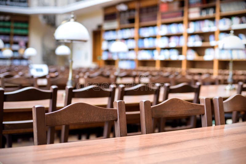 Tables in library hall stock image. Image of circulating - 78111467
