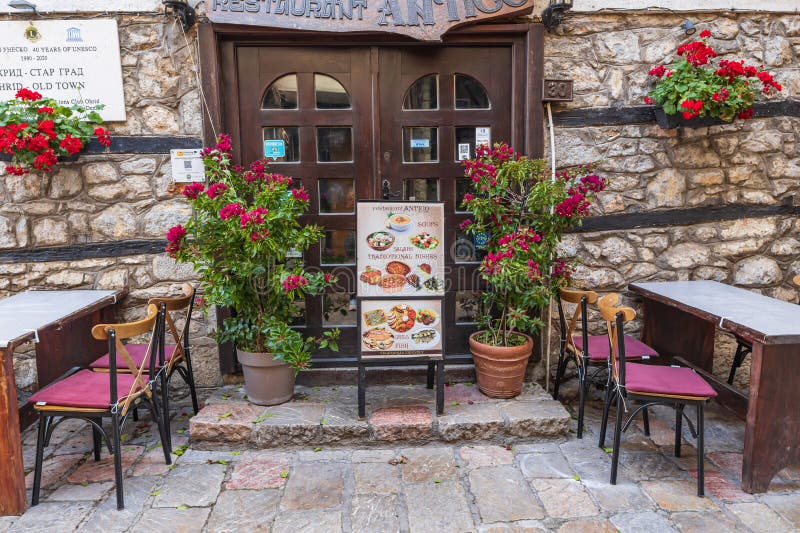 Tables and Menu Board at a Sidewalk Cafe in Ohrid Editorial Stock Image ...