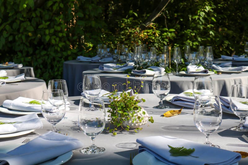 Tables Set Outdoors in Dappled Sunlight Stock Image - Image of tables ...