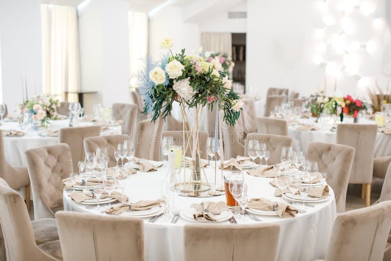 Tables Setting at a Luxury Wedding. Table for Guests. Dishes and Drinks ...