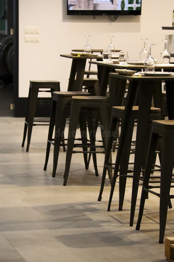 Tables with Stools in a Restaurant in Spain Stock Photo - Image of ...