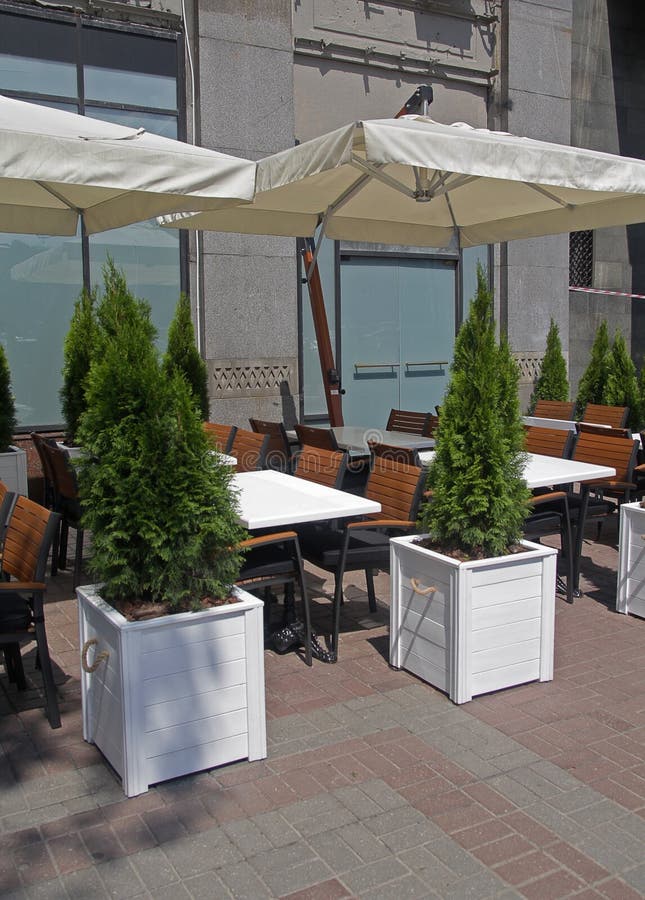 Tables of Street Cafe and Trees in Tubs Stock Image - Image of hotel ...