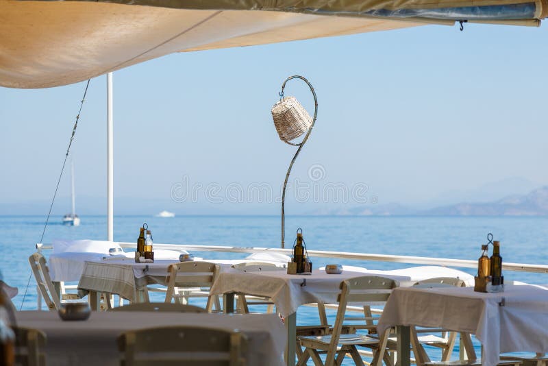 Tables on a Terrace in a Restaurant with a Sea View on a Mediterrainian ...