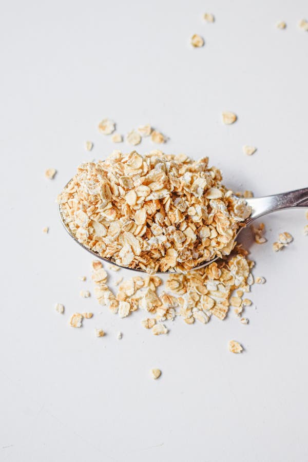 Tablespoon Oatmeal on White Backround Stock Photo - Image of flower ...