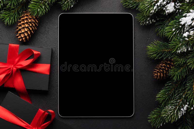 Tablet with Blank Screen, Gift Boxes and Christmas Decor Stock Image ...