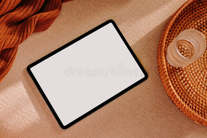 Tablet with Blank Screen Lying on the Light Couch Surface Stock Photo ...