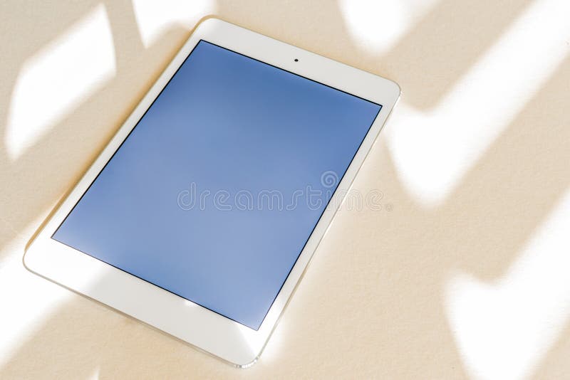 Tablet with Blue Screen on a Desk - Copy Space, Technology Concept ...