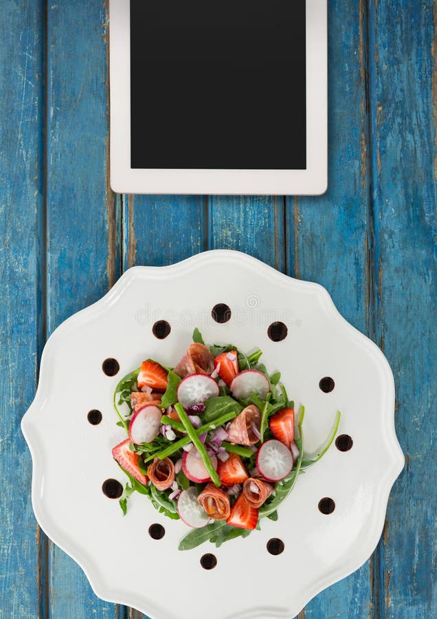 Tablet on Blue Wooden Desk with Food Stock Photo - Image of ready ...