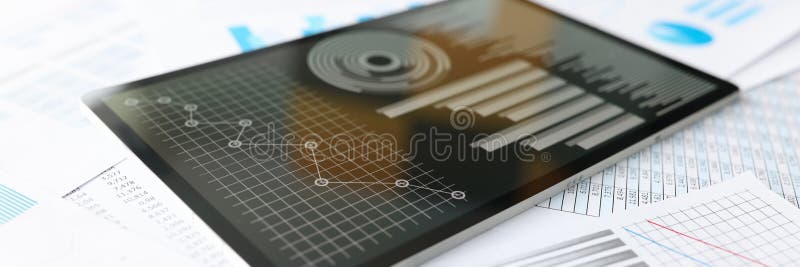 Tablet with Business Indicators in Charts is on Desktop Stock Image ...