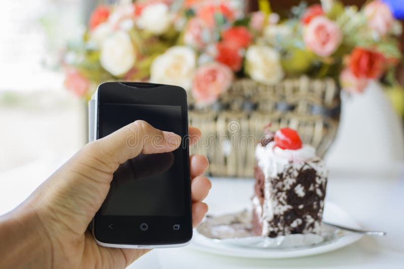 Tablet with Chocolate Cake on a Table Stock Image - Image of mobility ...
