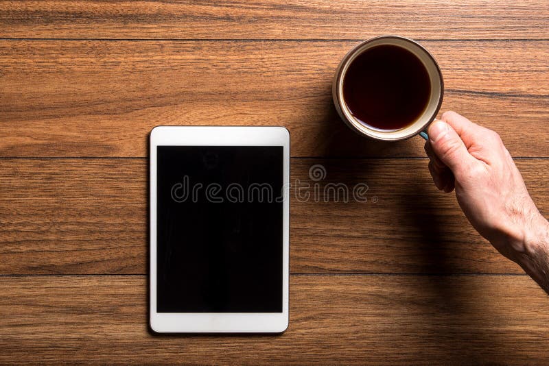 Tablet and coffee on wood stock photo. Image of minimal - 91007528
