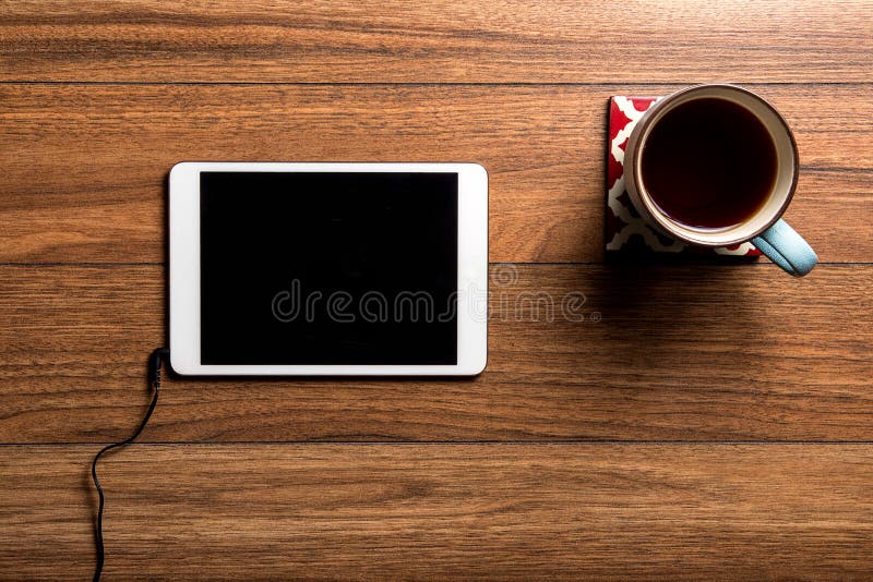 Tablet and Coffee on Wood with Wire Stock Photo - Image of headphone ...