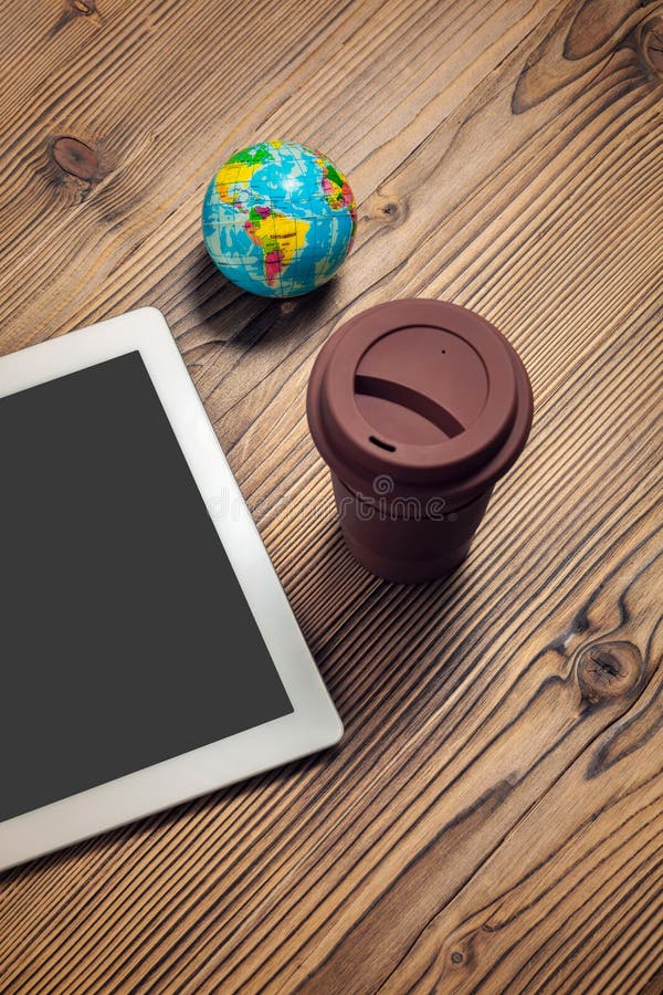 Tablet Computer, Coffee Cup and Globe on Wood Table Stock Photo - Image ...