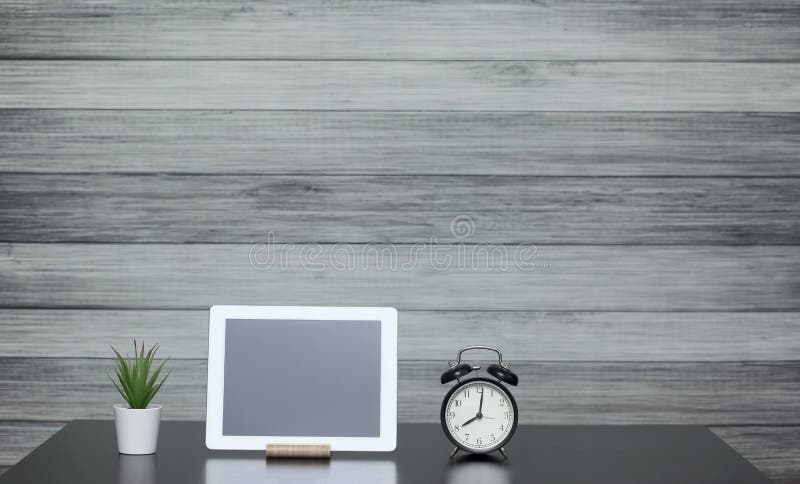 Tablet Computer, Home Plant, Clock on the Table. Work at Home. Gadgets ...