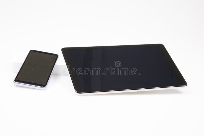 Tablet Computer in Landscape Orientation and Smartphone in Portrait ...