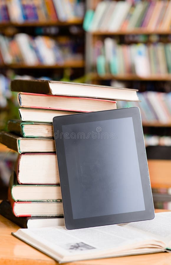 Tablet Computer in Library Near Books Stock Image - Image of page ...